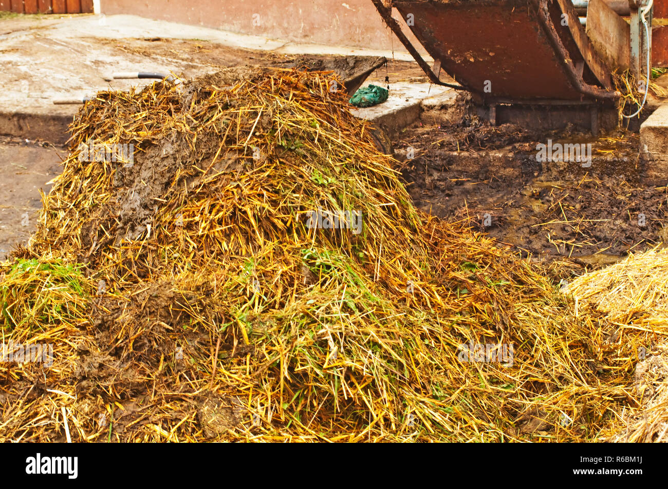 Dung Heap With Crane Stock Photo - Alamy