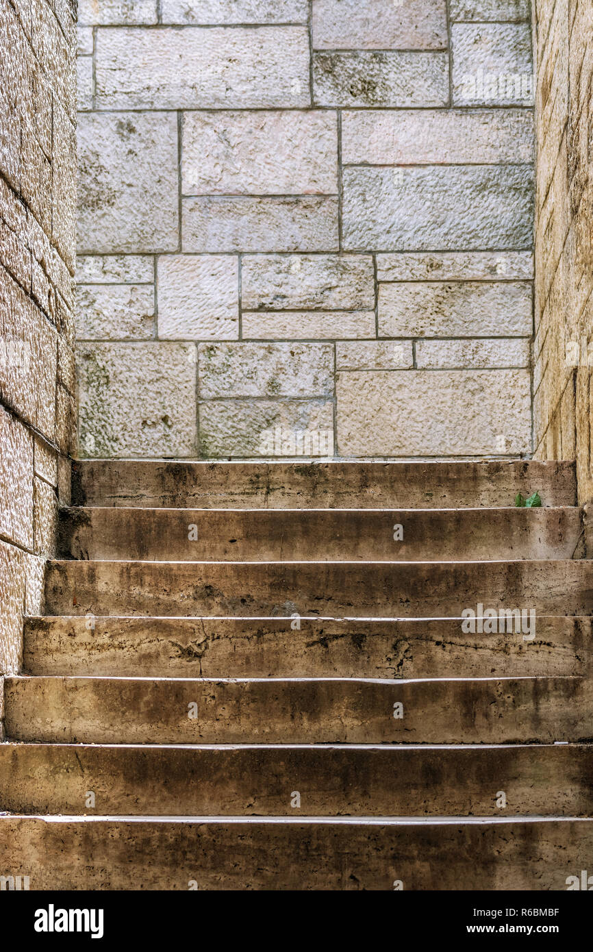 The stone steps of the staircase inside the building are made of stone ...