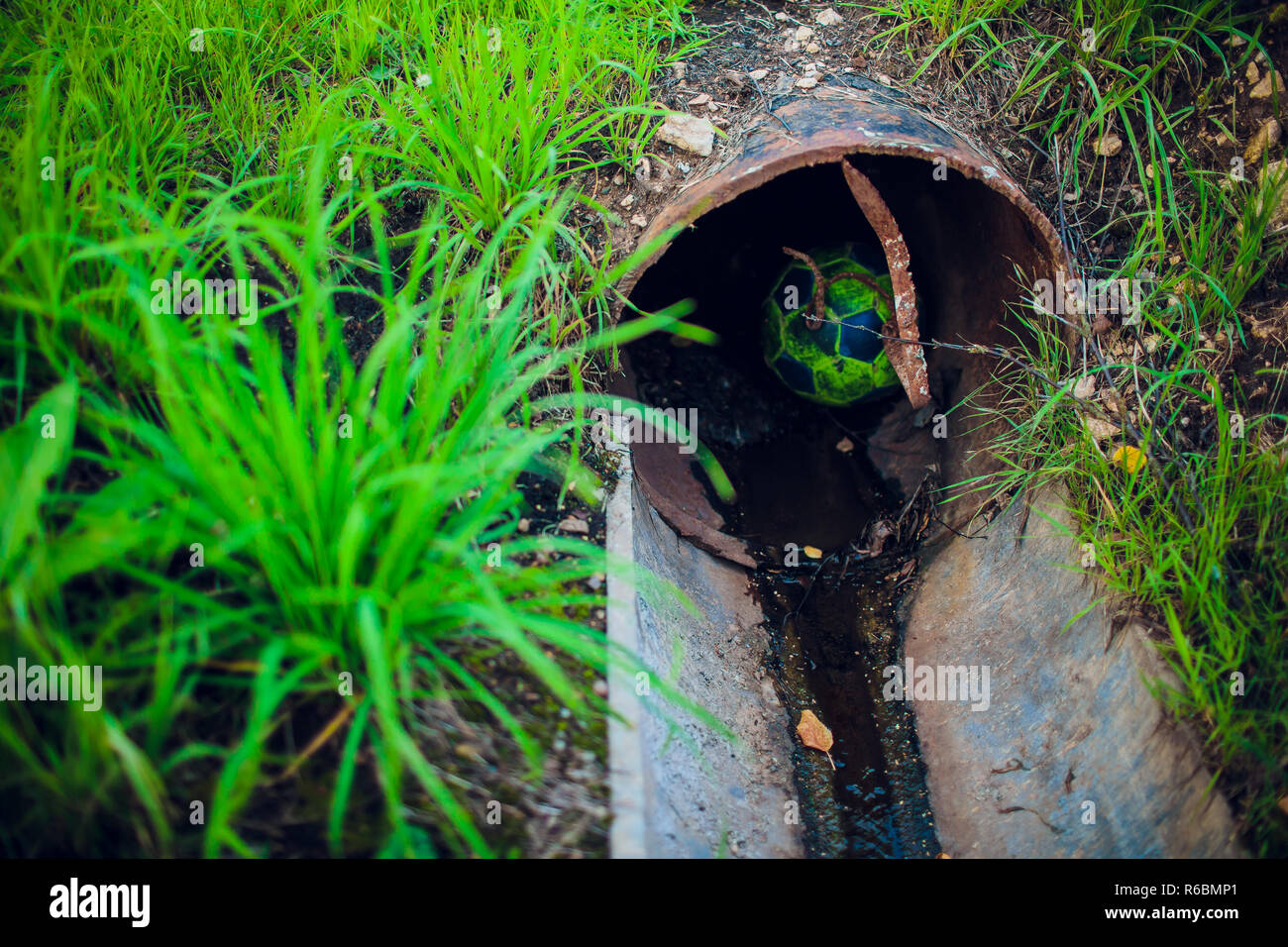 the ball is stuck in sewer pipe, the canal. Halloween, as in the horror ...