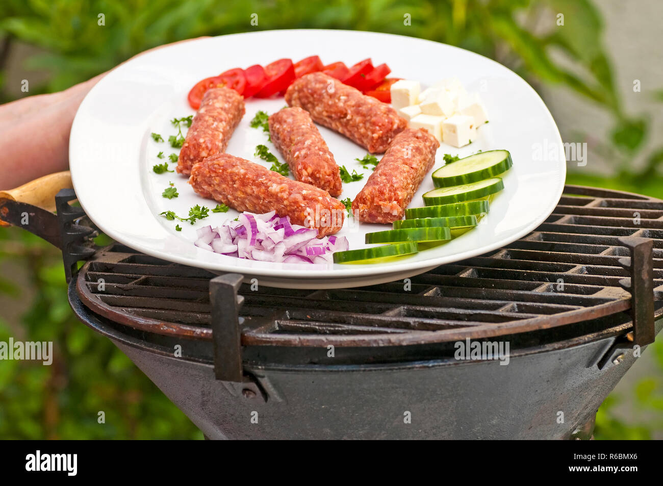 Croatian deli cevapi on barbecue hi-res stock photography and images ...