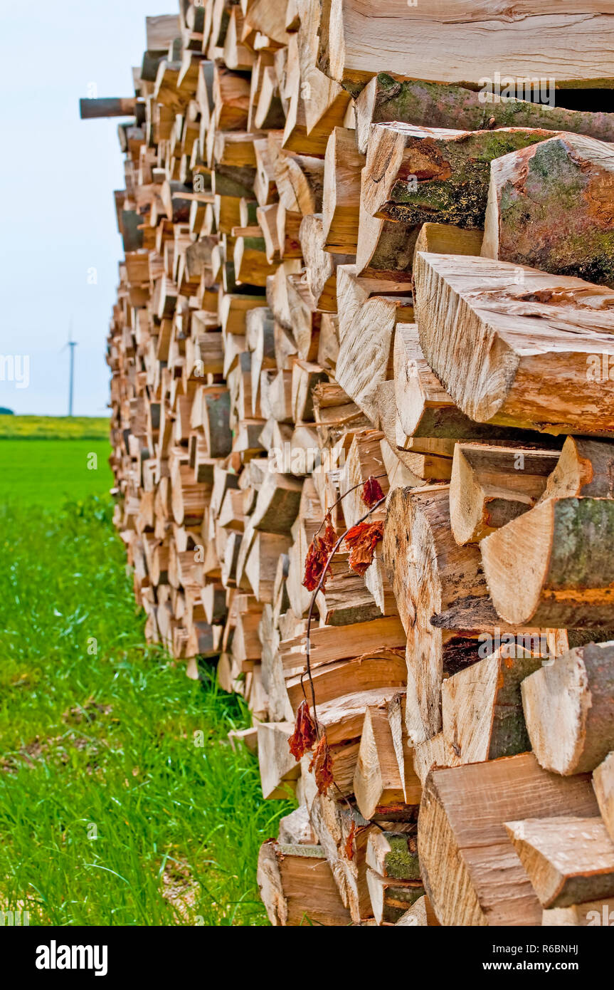 Fuel-Wood And Wind-Wheel Stock Photo - Alamy
