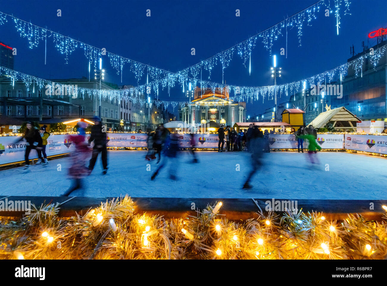KATOWICE, POLAND - DECEMBER 11, 2015: Ice skating rink and traditional ...