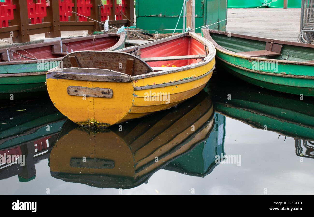 Yellow rowing boat Stock Photo - Alamy