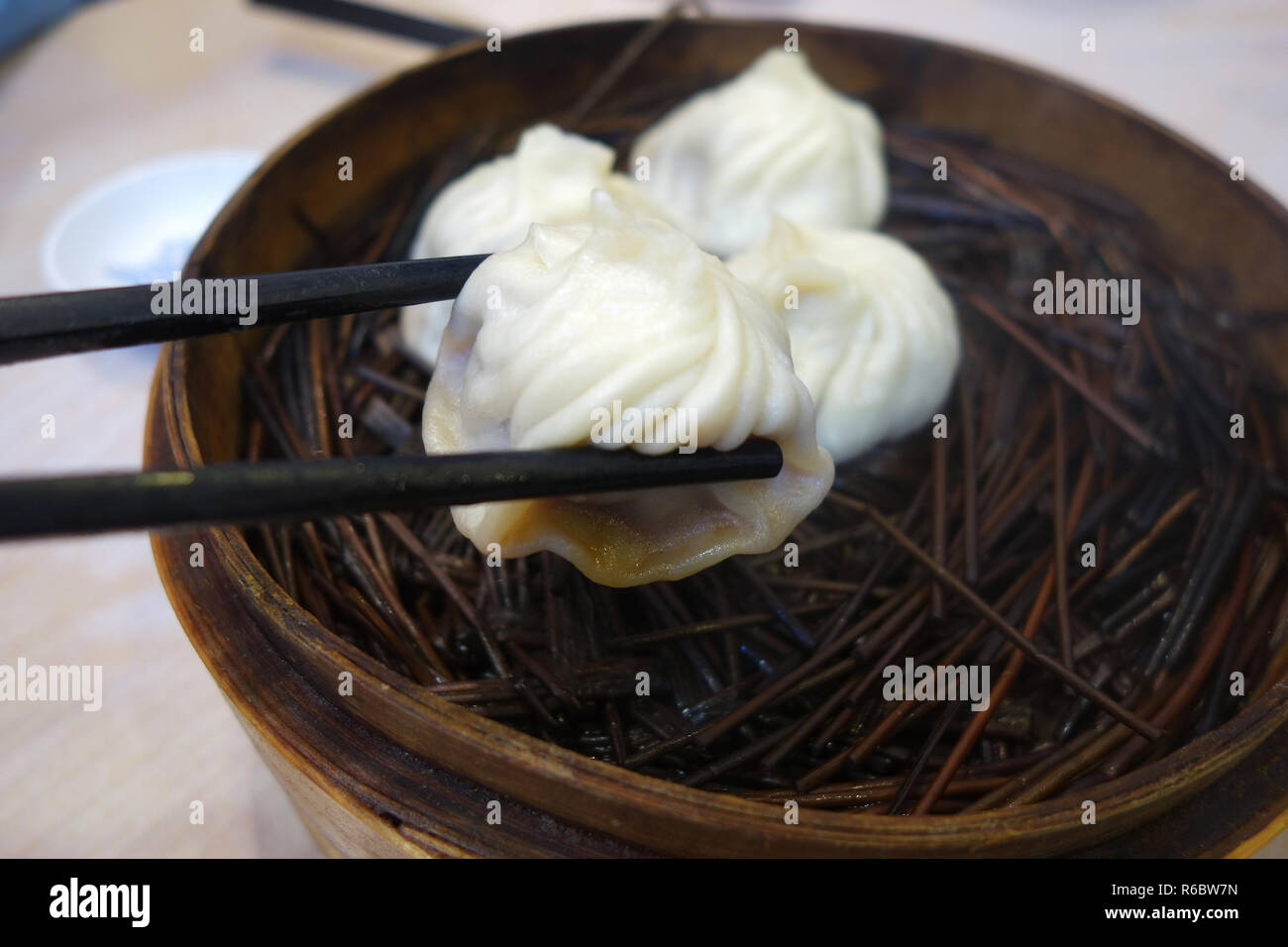 Traditional soup dumpling Xiao Long Bao Stock Photo - Alamy