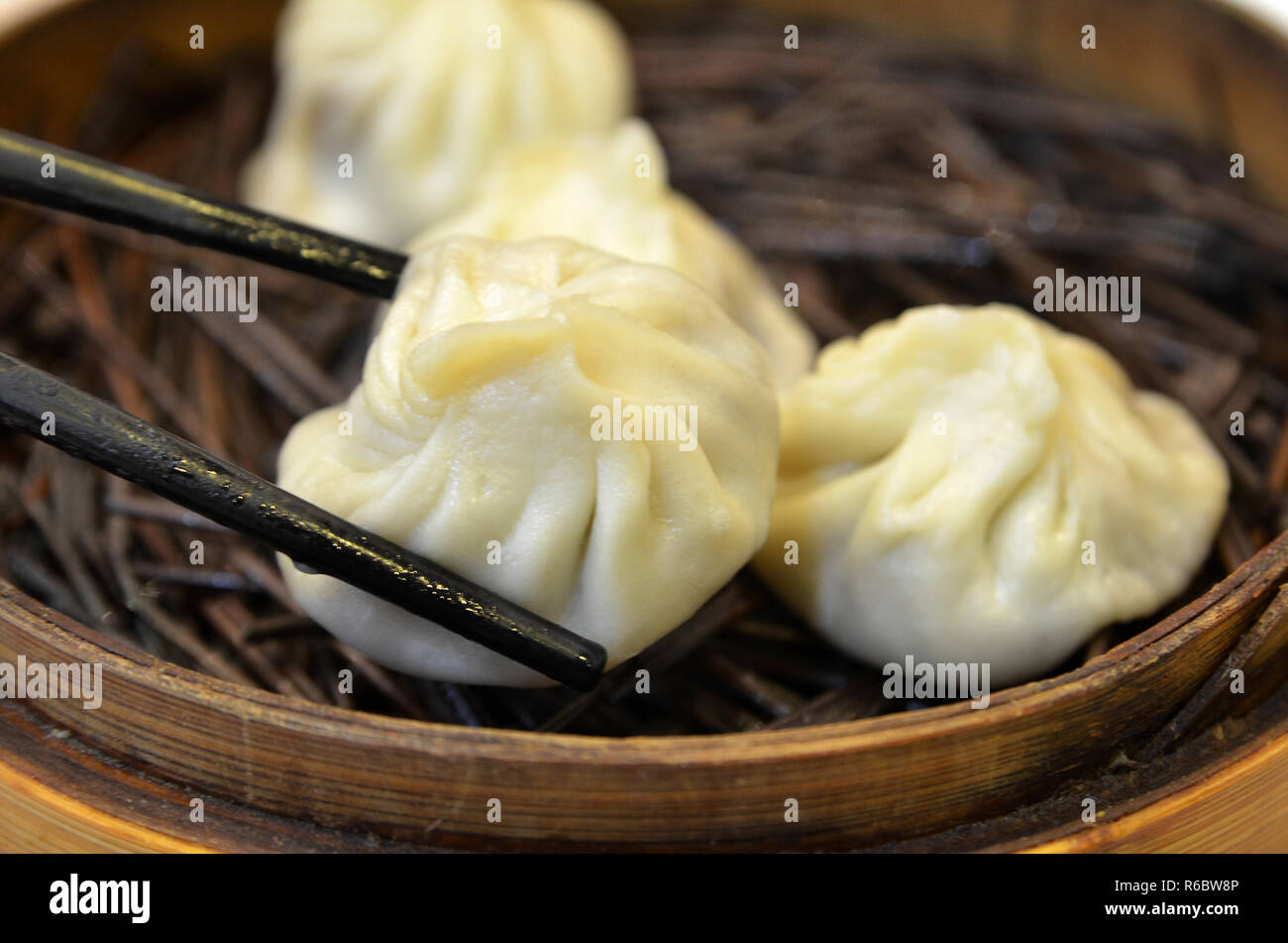 Traditional soup dumpling Xiao Long Bao Stock Photo - Alamy