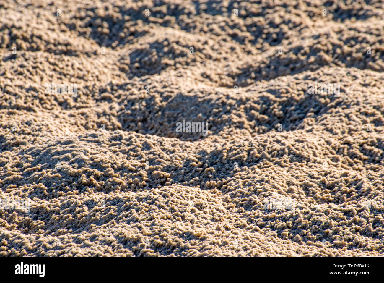 Sand Of A Beach With Shapes Stock Photo - Alamy