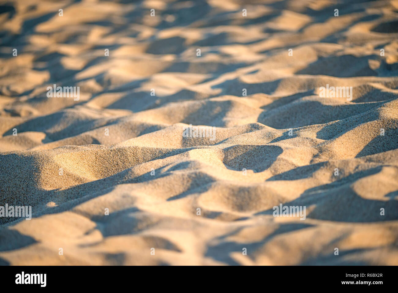 Sand Of A Beach With Shapes Stock Photo - Alamy