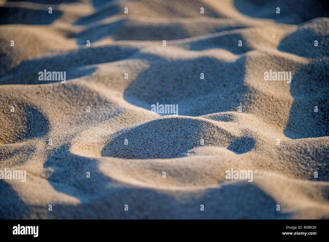 Sand Of A Beach With Shapes Stock Photo - Alamy