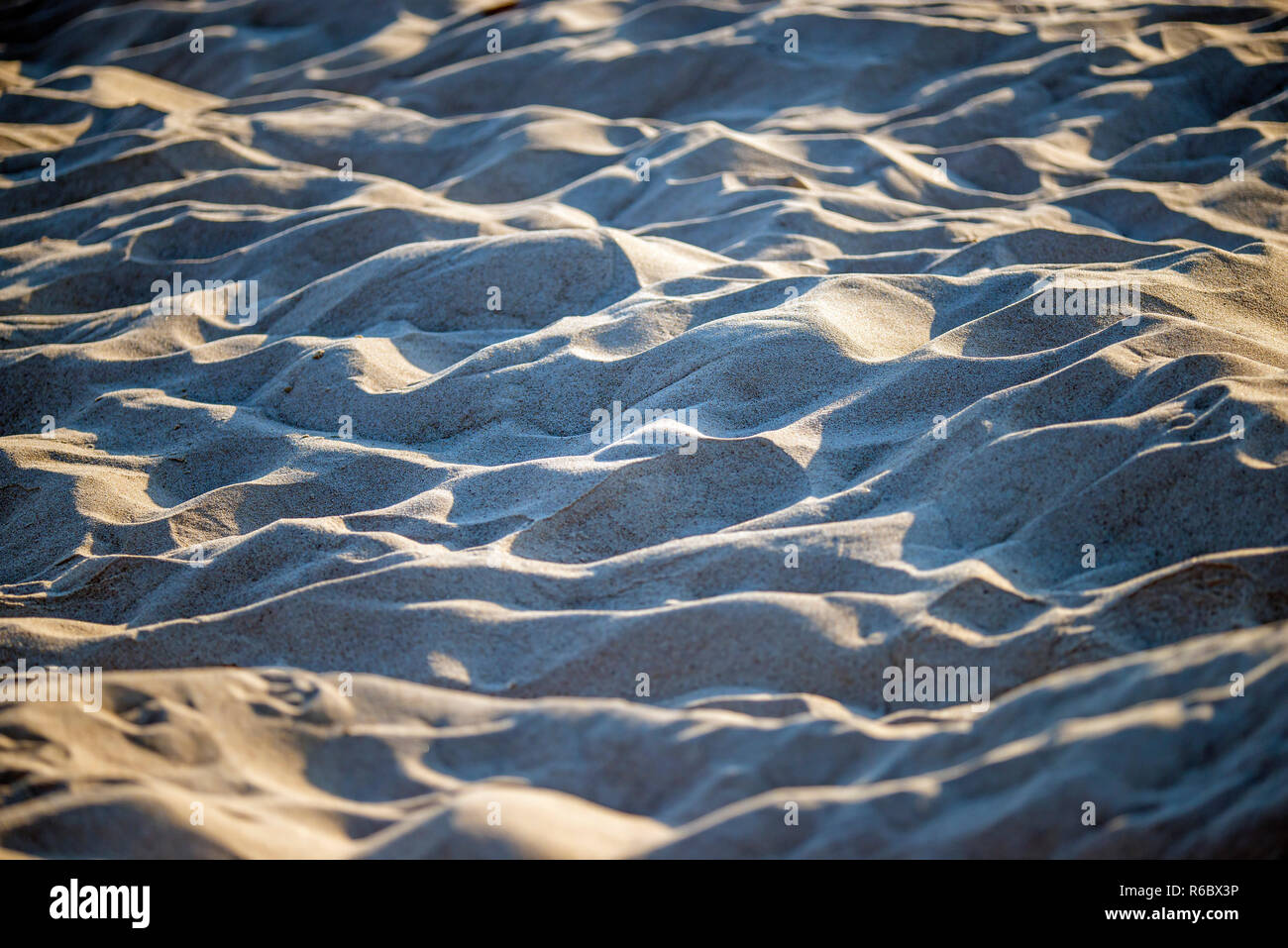 Sand Of A Beach With Shapes Stock Photo - Alamy