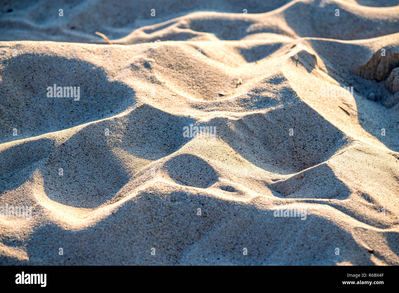 Sand Of A Beach With Shapes Stock Photo - Alamy