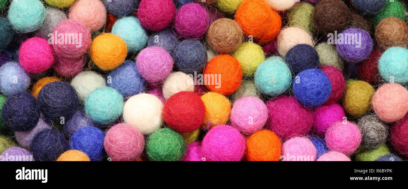 background of balls made with colored wool Stock Photo - Alamy