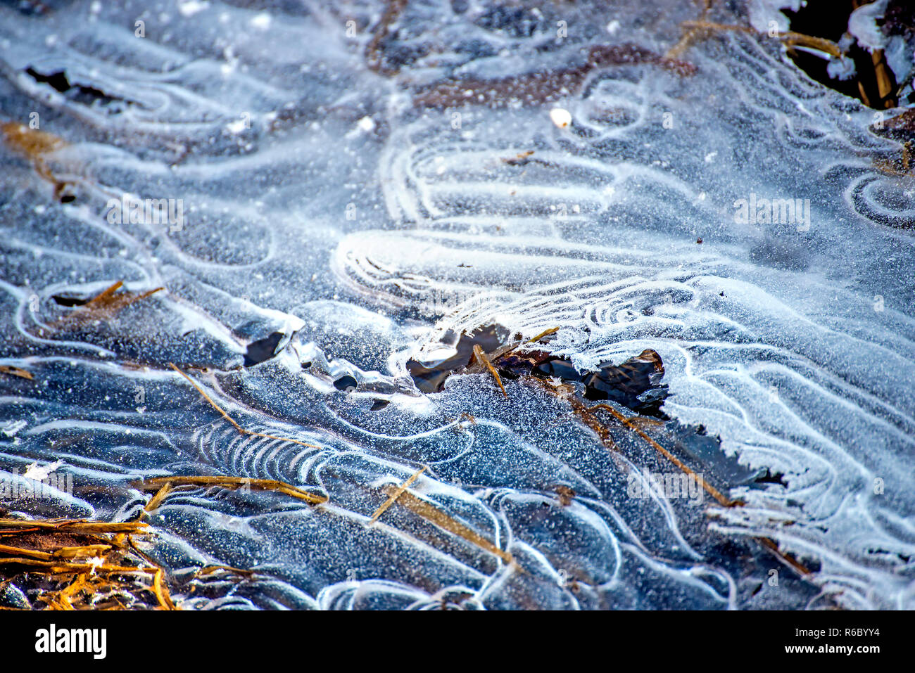Ice On A Creek Stock Photo - Alamy
