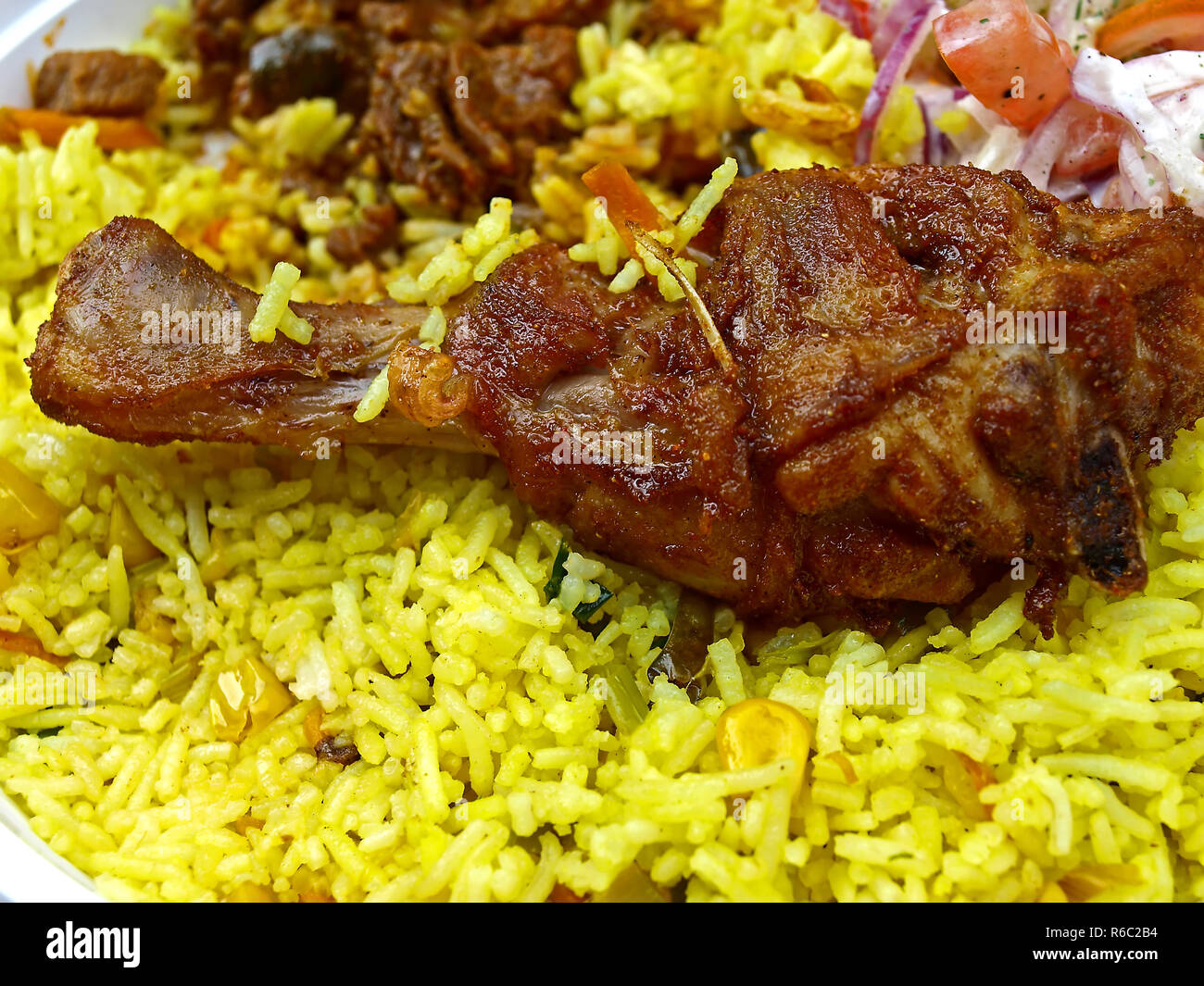 Indian Food Chicken With Rice And Salad Stock Photo - Alamy