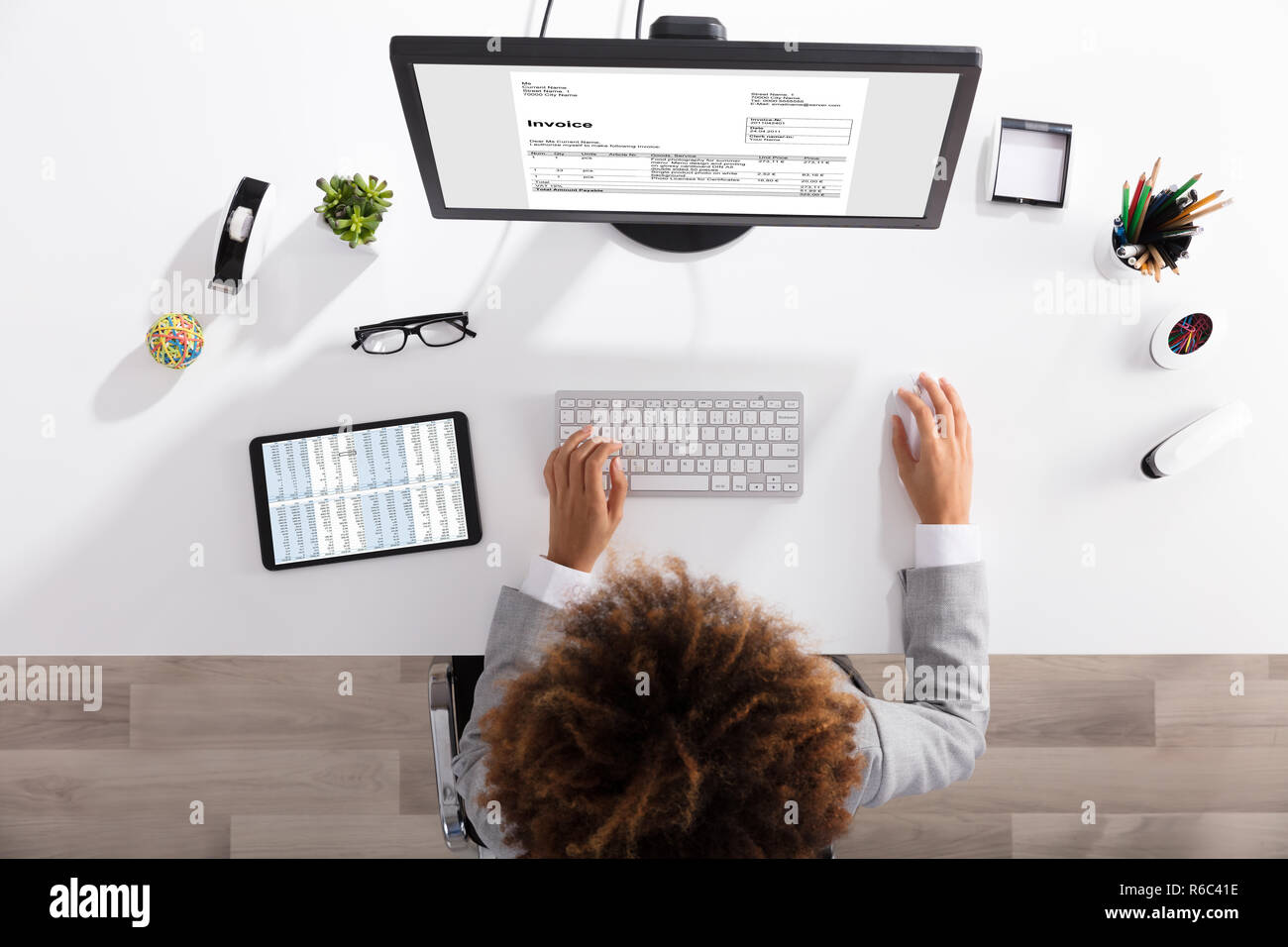 Businessperson Working On Computer Stock Photo - Alamy