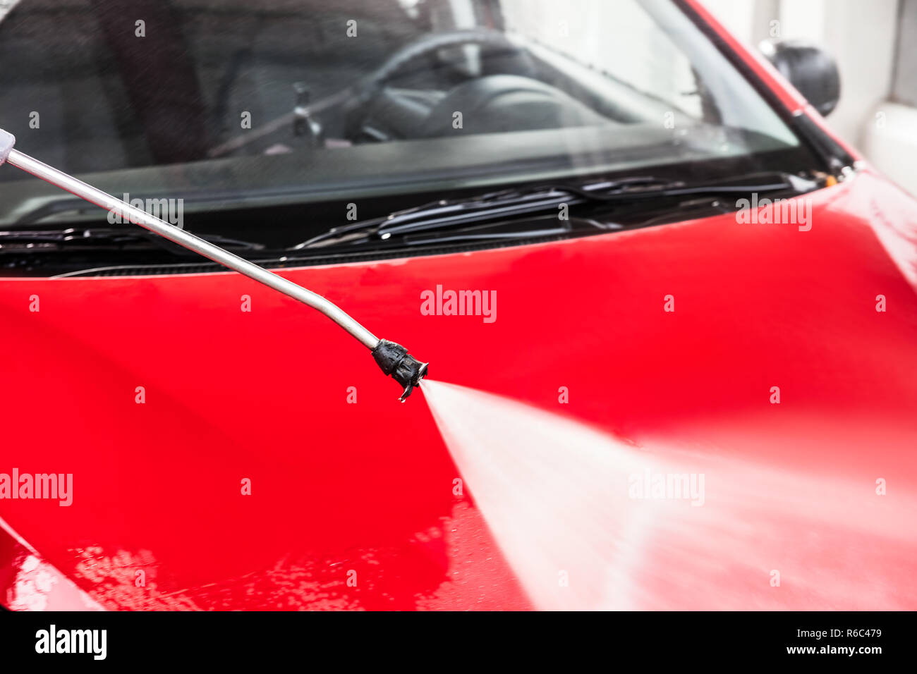 Washing Red Car Stock Photo - Alamy