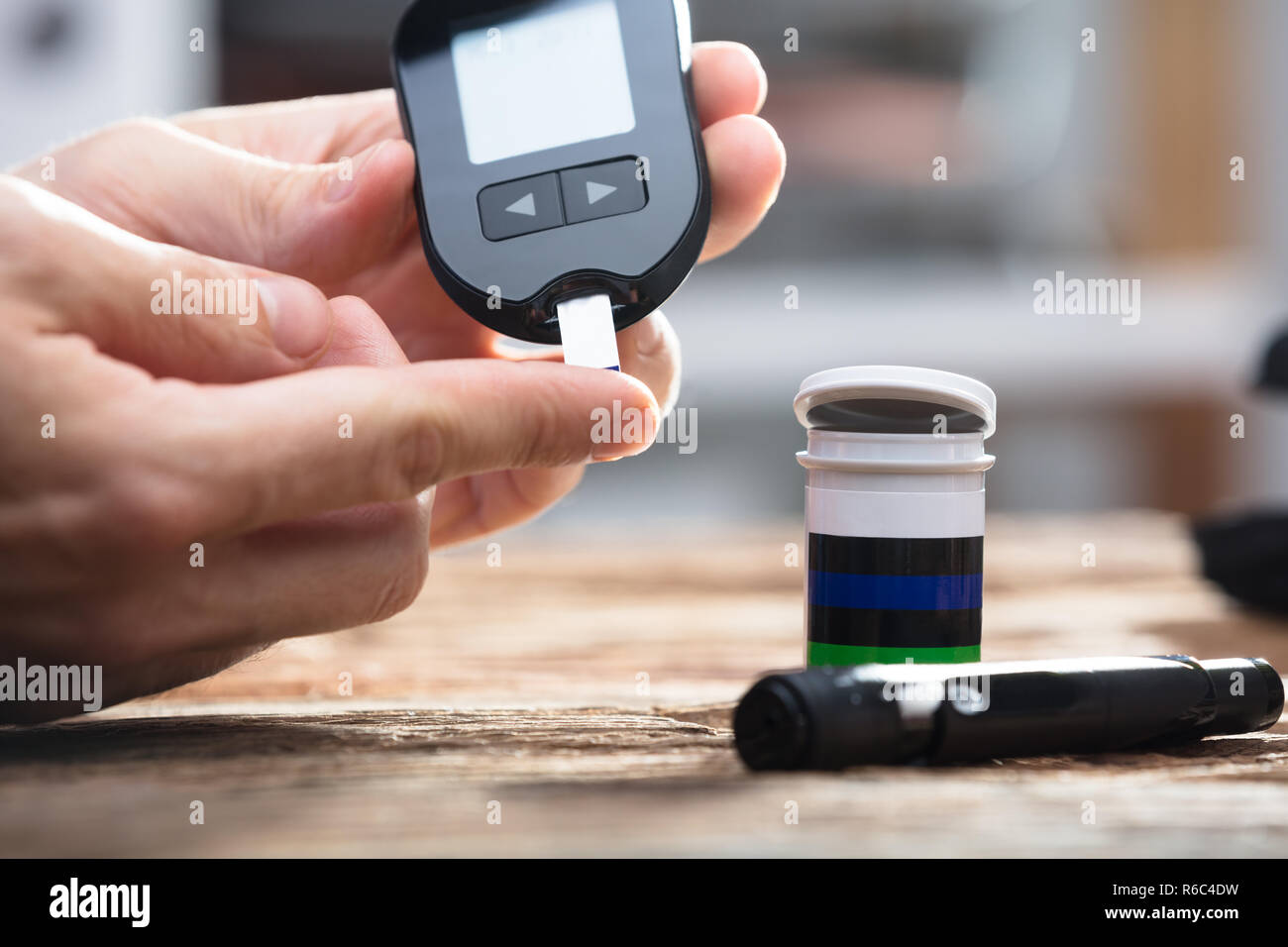 Person Checking Blood Sugar Level With Glucometer Stock Photo - Alamy
