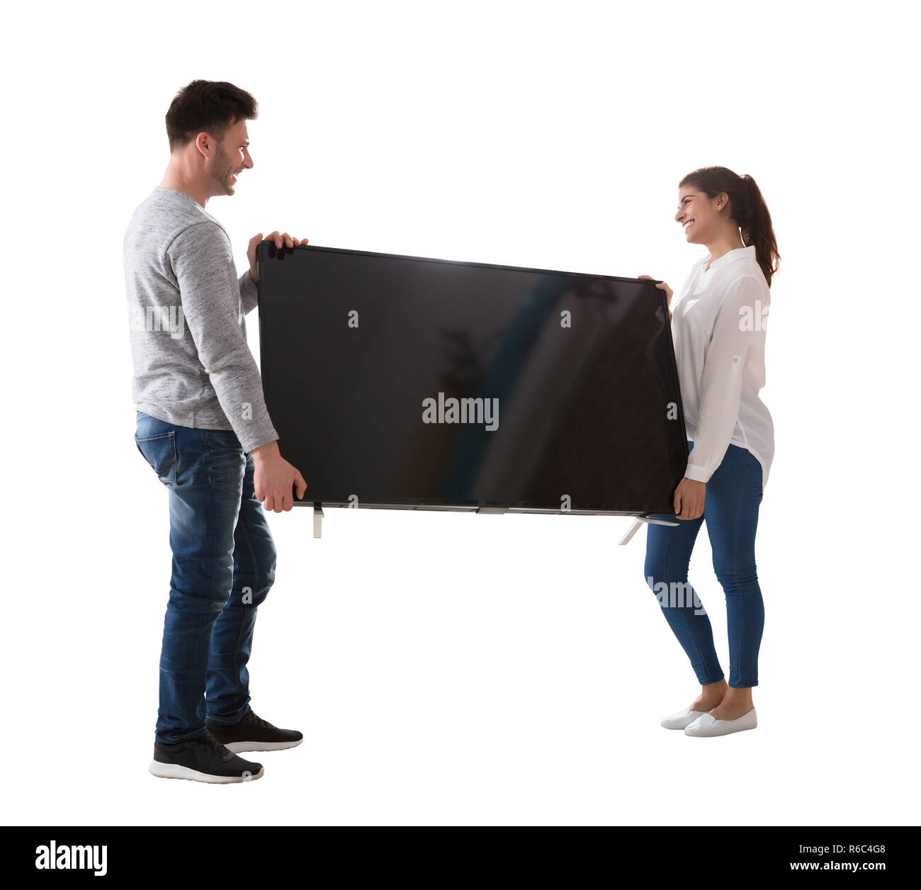 Woman carrying tv screen hi-res stock photography and images - Alamy