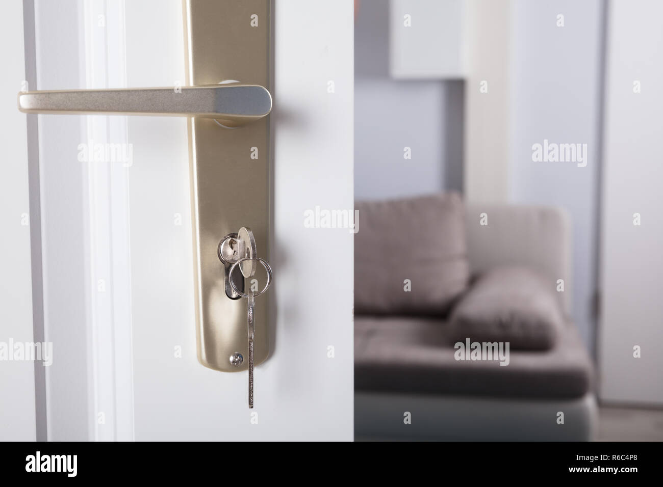 Door Handle With Inserted Key Stock Photo - Alamy
