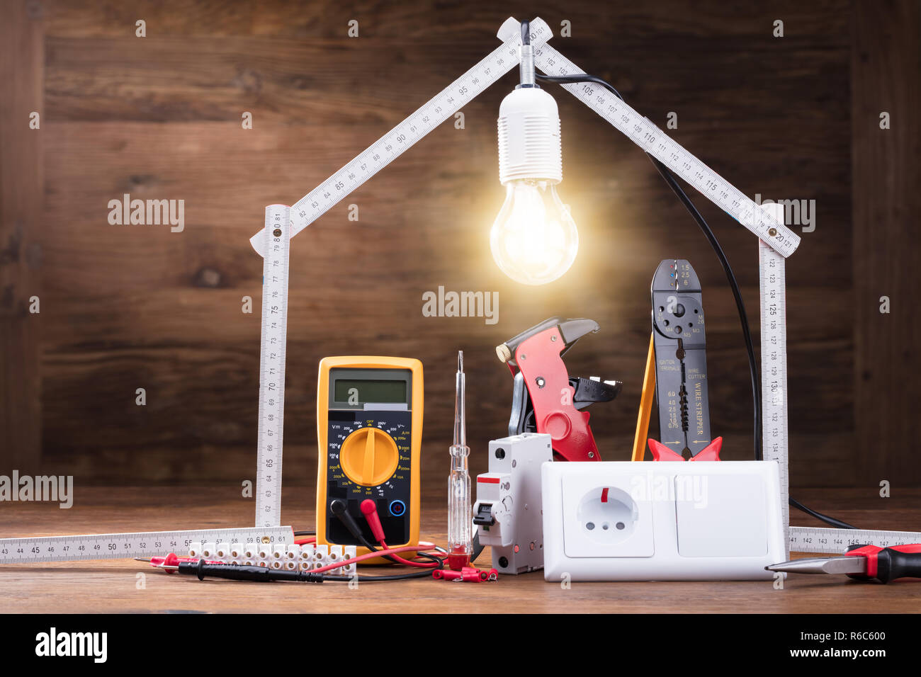 Repair Tools Under The Illuminated House Stock Photo - Alamy