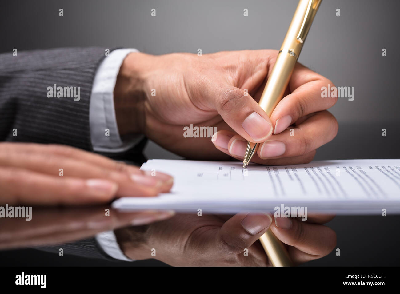 Judge Writing On Document Stock Photo - Alamy