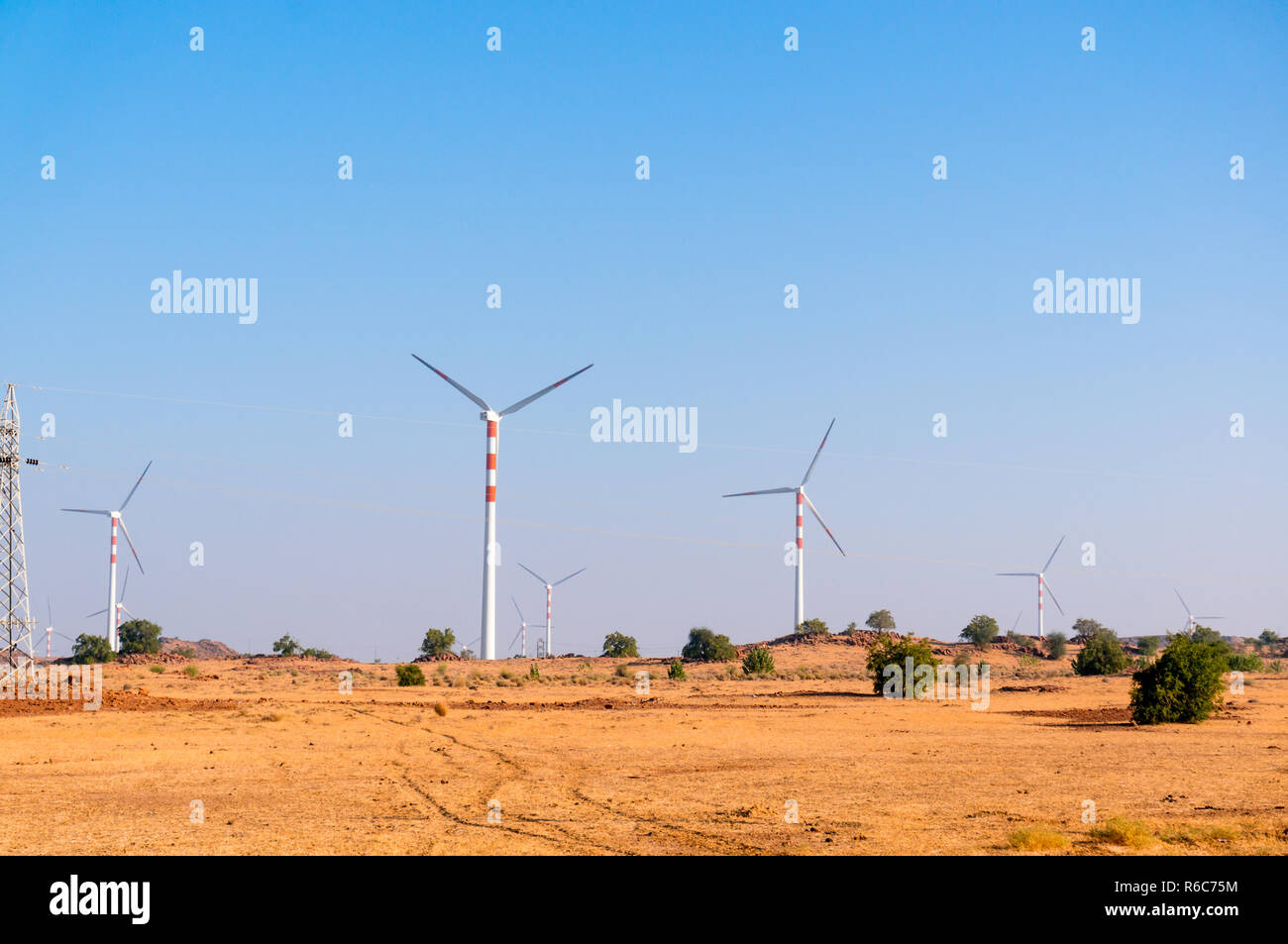 Windmills in the desert of Rajasthan near Jaisalmer Stock Photo - Alamy
