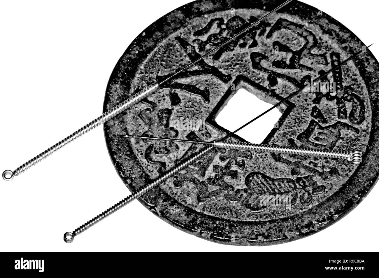 Acupuncture needles antique chinese coin hi-res stock photography and ...