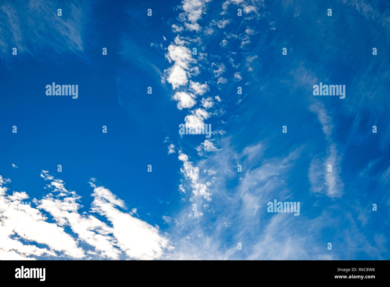 Blue Sky With Layers Of Clouds Stock Photo - Alamy