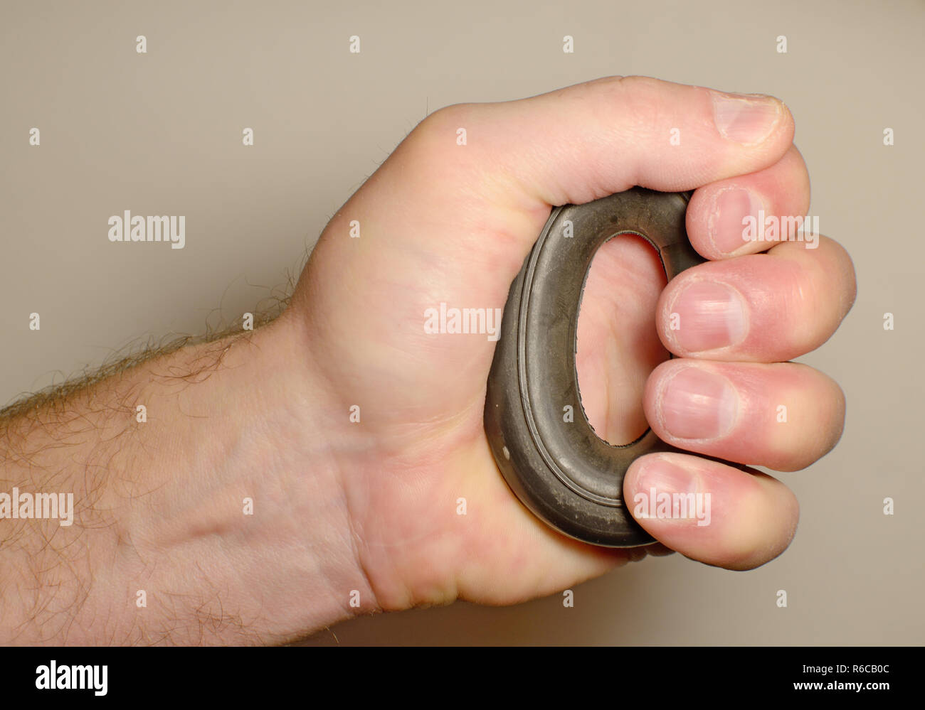 Power expander in hand Stock Photo - Alamy