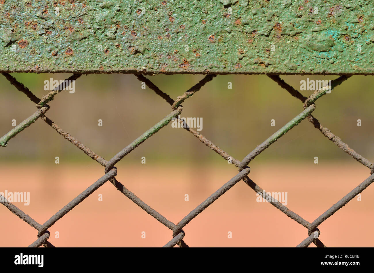 A fence made of iron net.The wire is twisted into a rigid mesh Stock ...