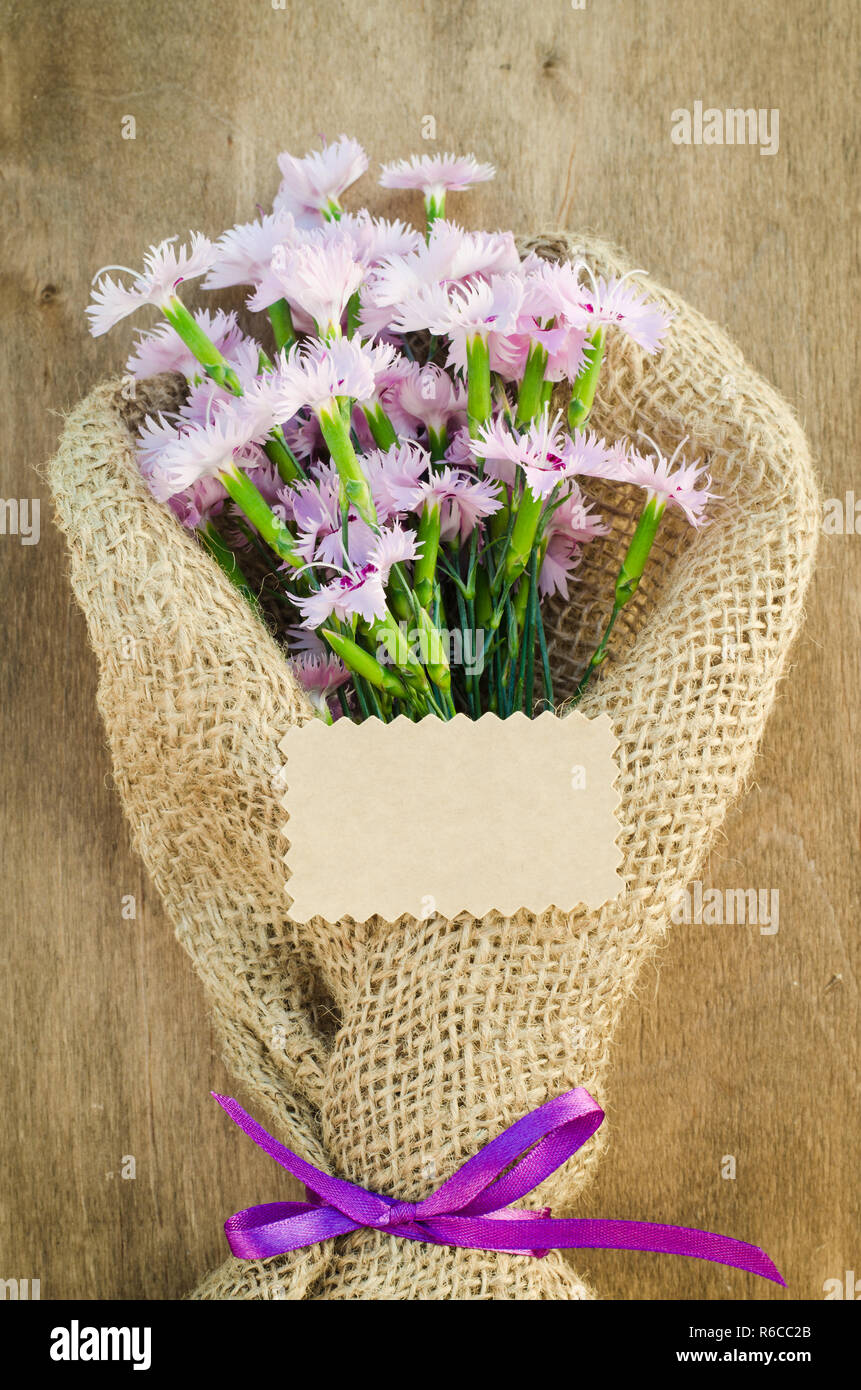 Delicate flowers and empty greeting card Stock Photo - Alamy