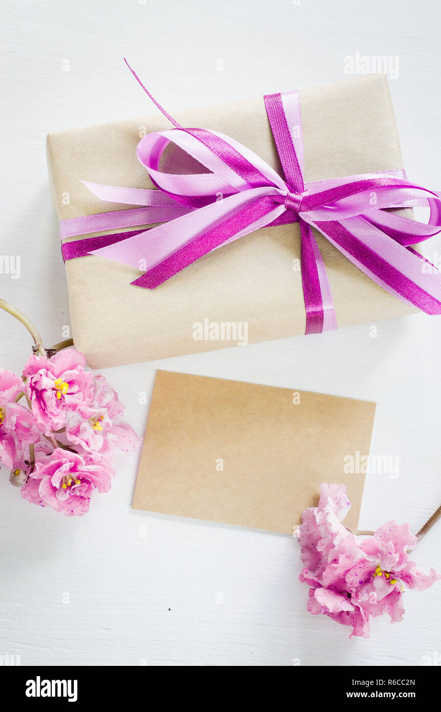 Present or gift box and empty greeting card Stock Photo - Alamy