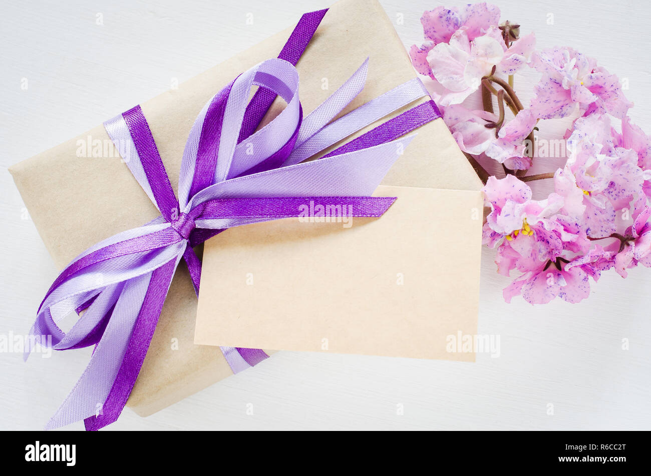 Present or gift box and empty greeting card Stock Photo - Alamy