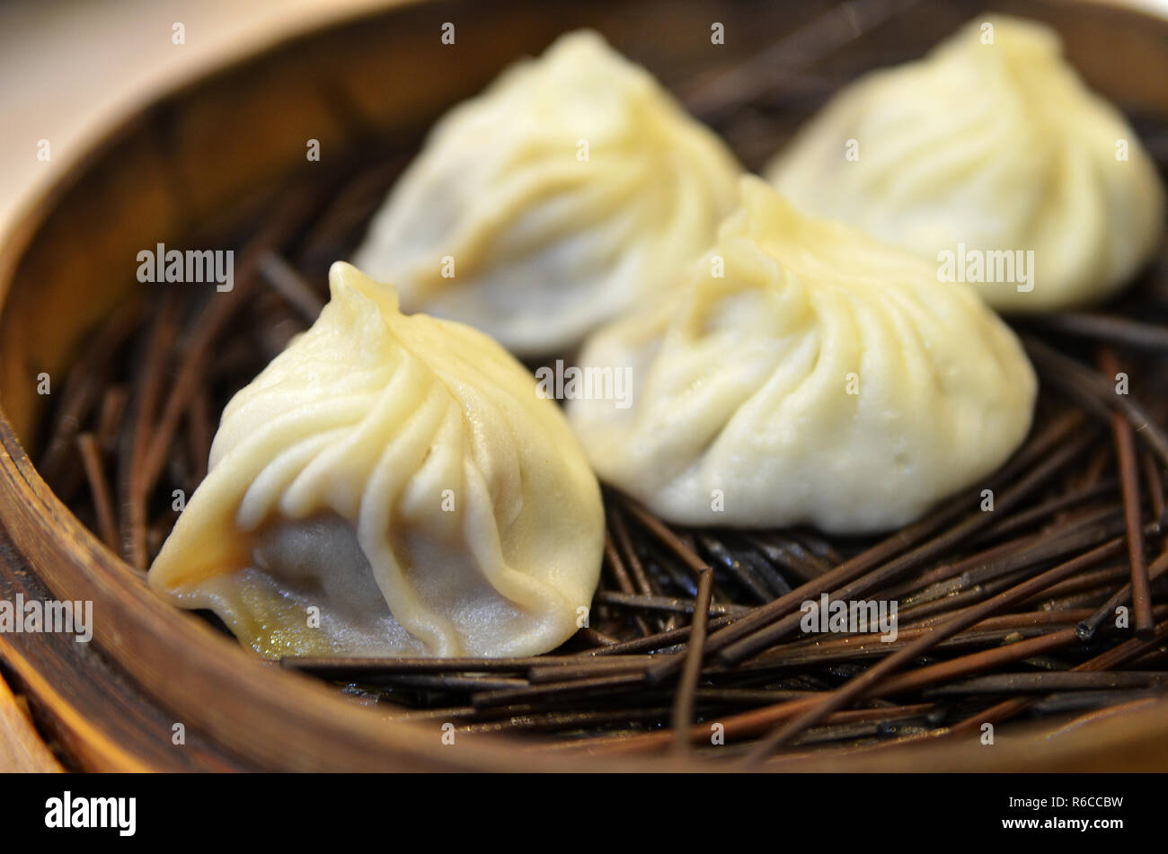 Traditional soup dumpling Xiao Long Bao Stock Photo - Alamy