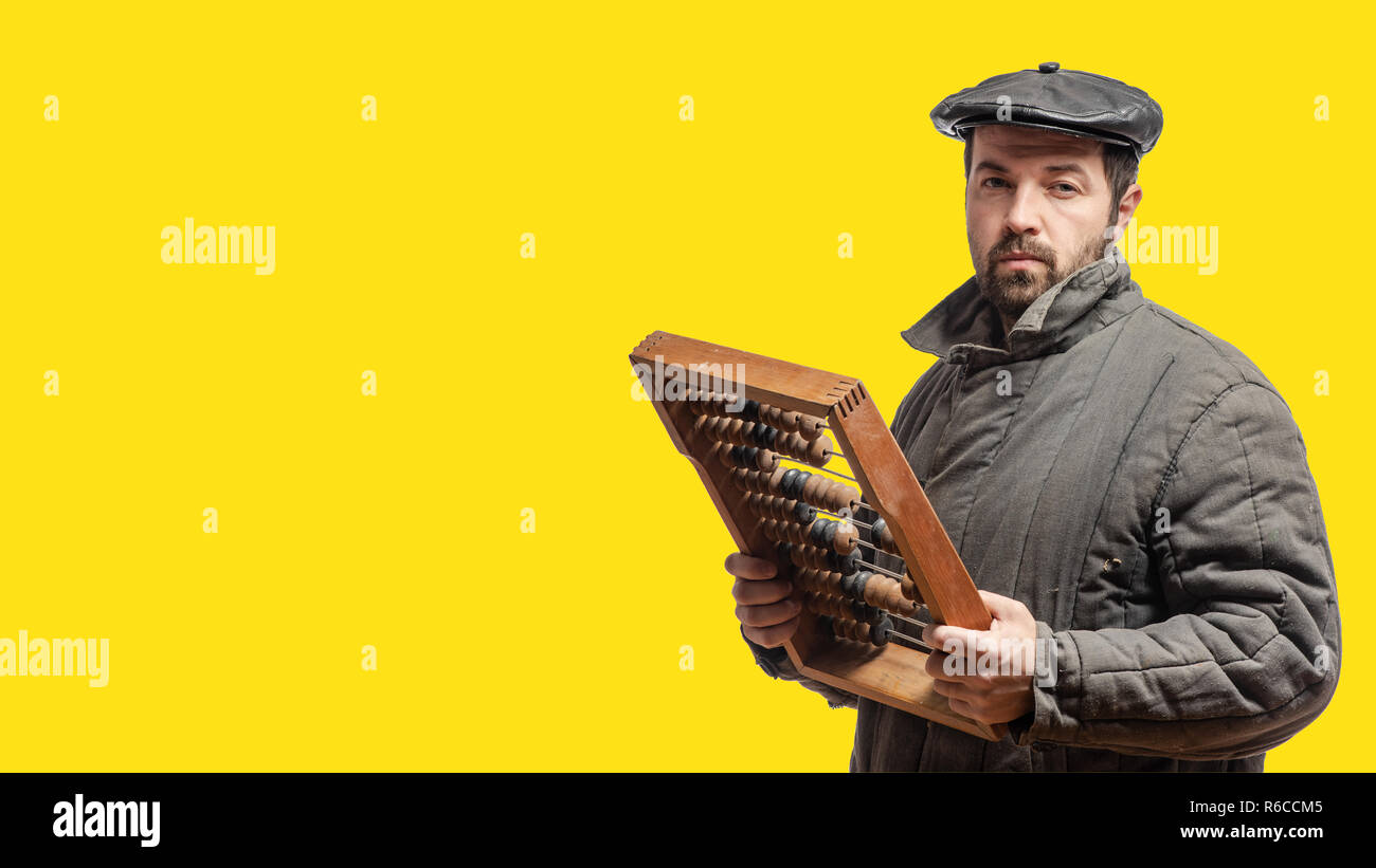 Idea: old-fashioned financial auditor with retro wooden abacus, studio ...