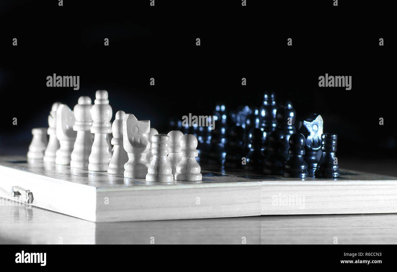 chess composition on dark background. strategy concept Stock Photo - Alamy
