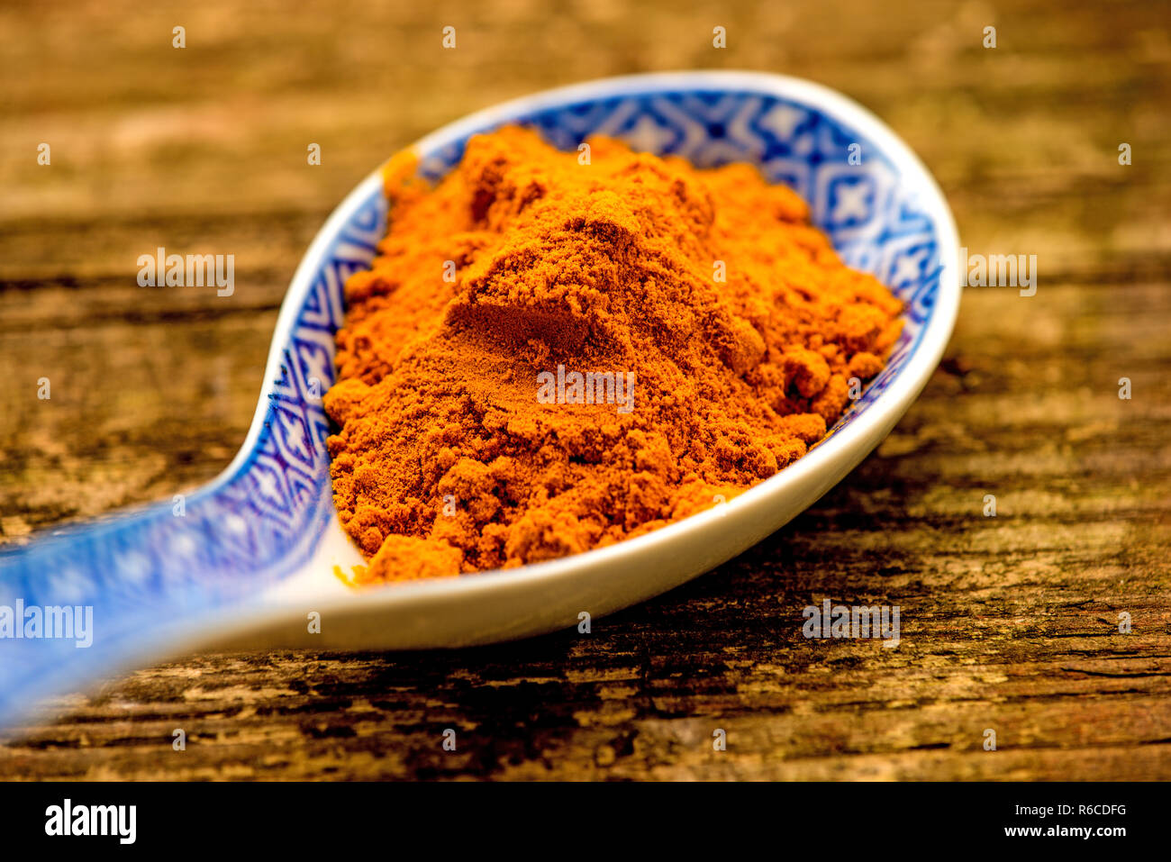 Turmeric Powder On A Spoon Stock Photo - Alamy