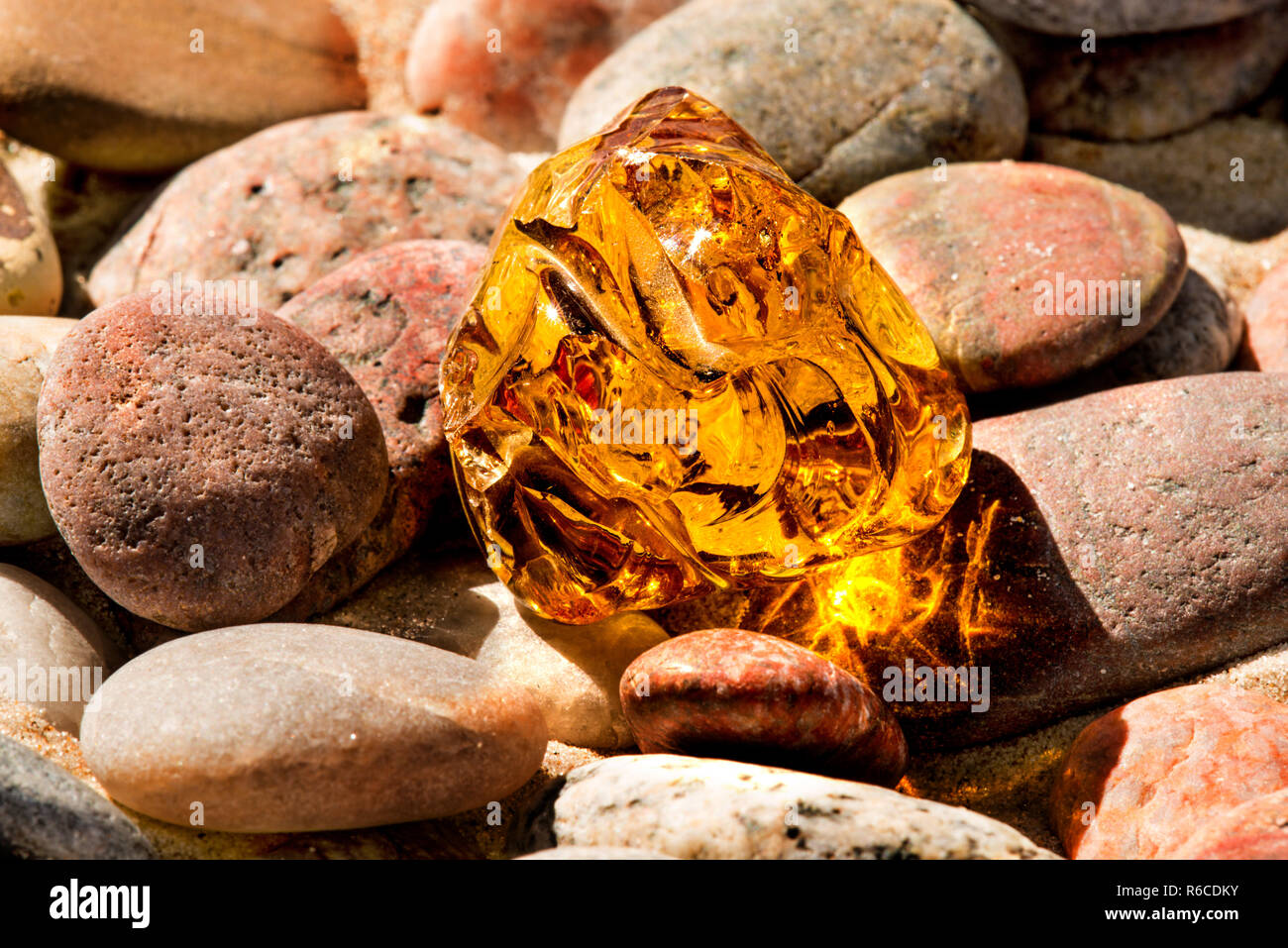 Amber On A Beach Of The Baltic Sea Stock Photo - Alamy
