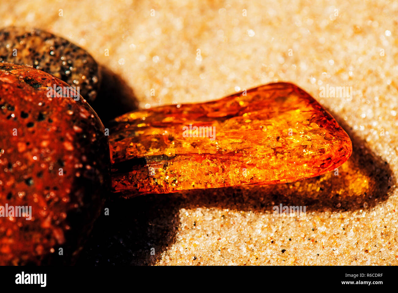 Amber On A Beach Of The Baltic Sea Stock Photo - Alamy