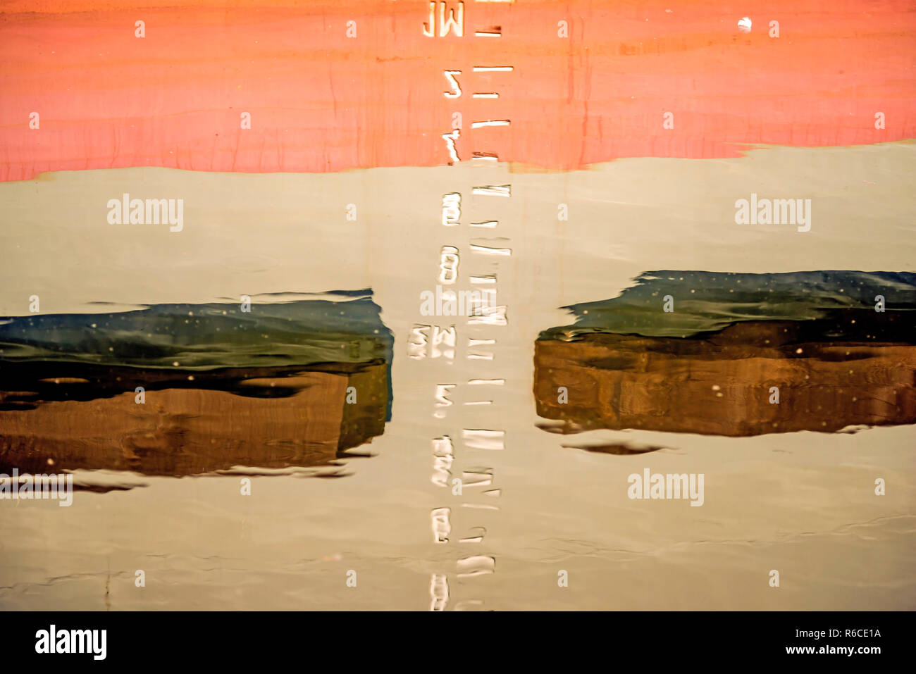 Marking The Draft Reflected In The Harbor Water Stock Photo - Alamy