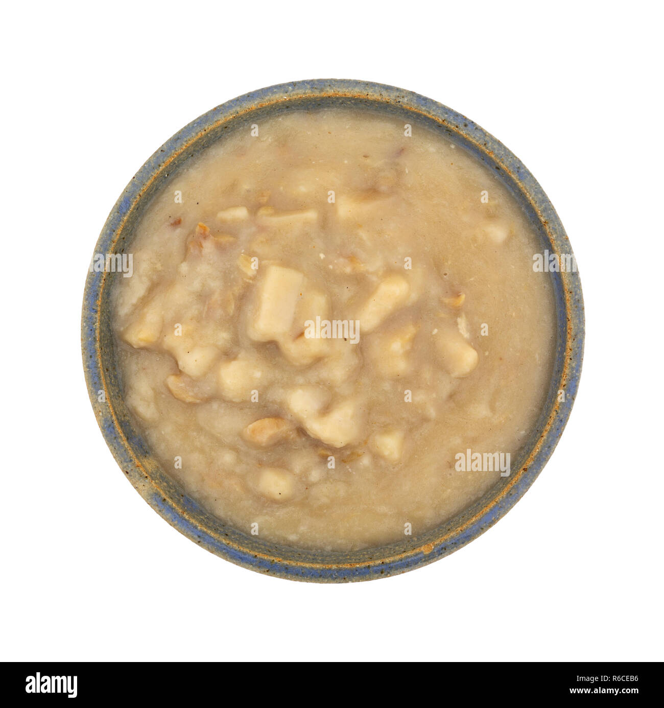 Top view of a serving of fish chowder in a bowl isolated on a white ...