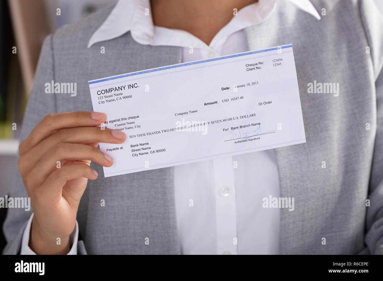 African american women writing check hi-res stock photography and ...