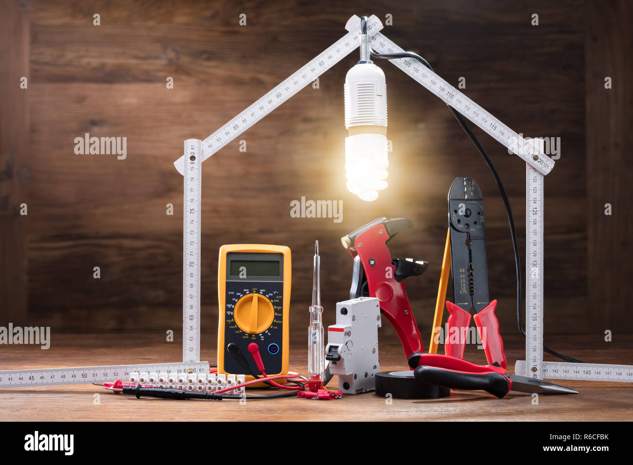 Repair Tools Under The Illuminated House Stock Photo - Alamy