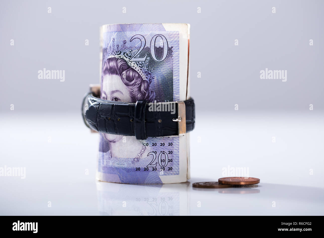 Rolled Up Twenty Pounds Currency Note Inside The Wrist Watch Stock ...