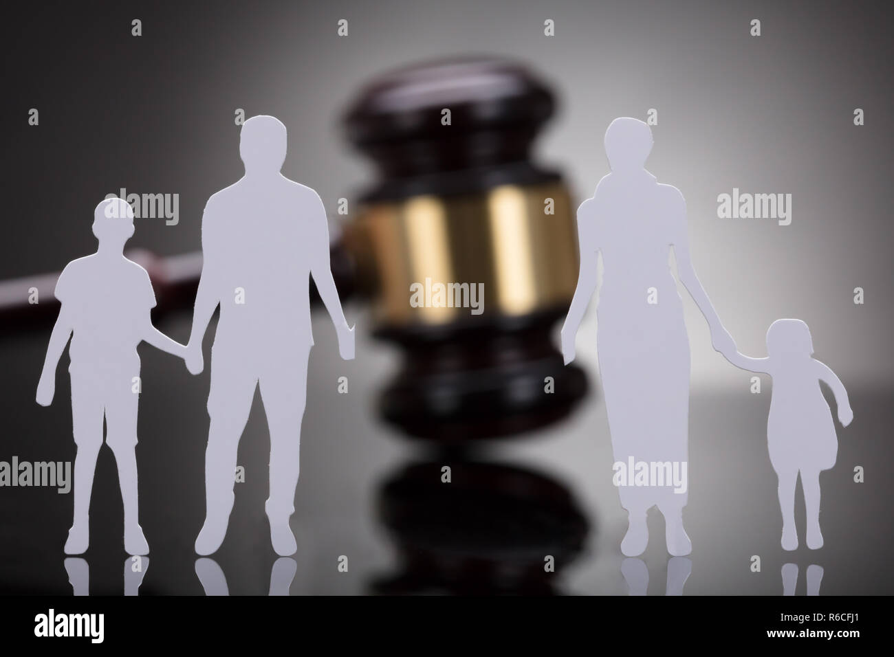 Separation Of Family Figure Cut Out Stock Photo - Alamy