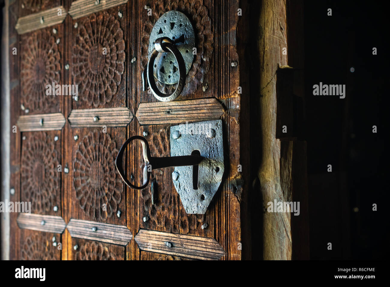 Big key in rustic door of wooden church Stock Photo - Alamy