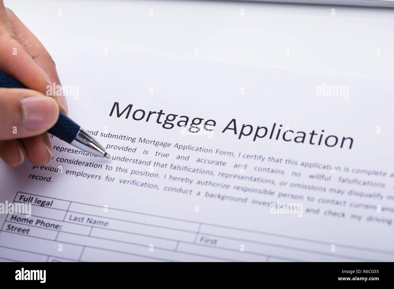 Hand applying application form hi-res stock photography and images - Alamy