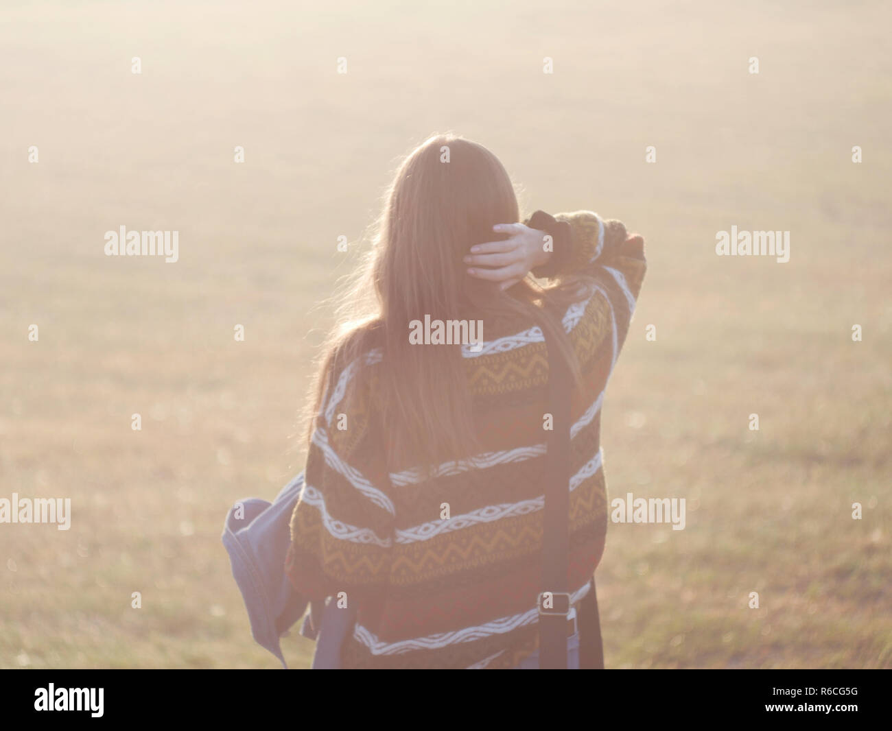 Girl in sunrise Stock Photo - Alamy