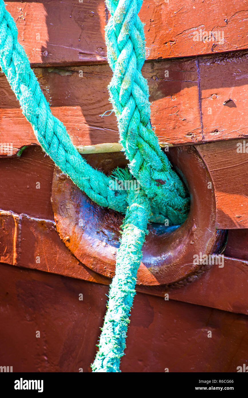 Rope With Anchored Ship Stock Photo - Alamy