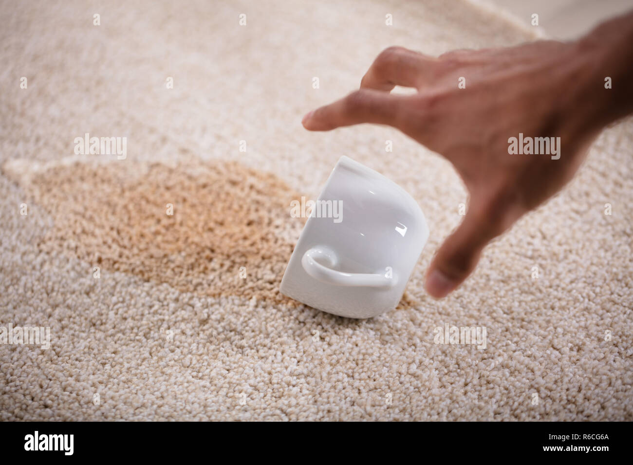 Close-up Of A Person Picking Coffee Cup Stock Photo - Alamy