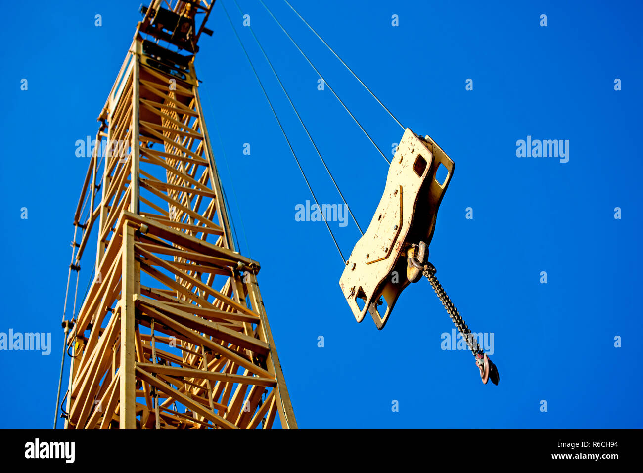 Building Crane With Chain And Hook Stock Photo - Alamy